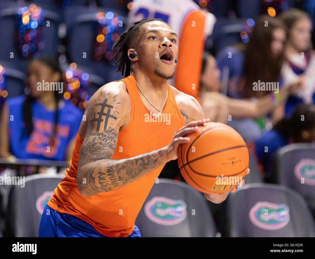 Florida guard Will Richard warms up before an NCAA college basketball ...