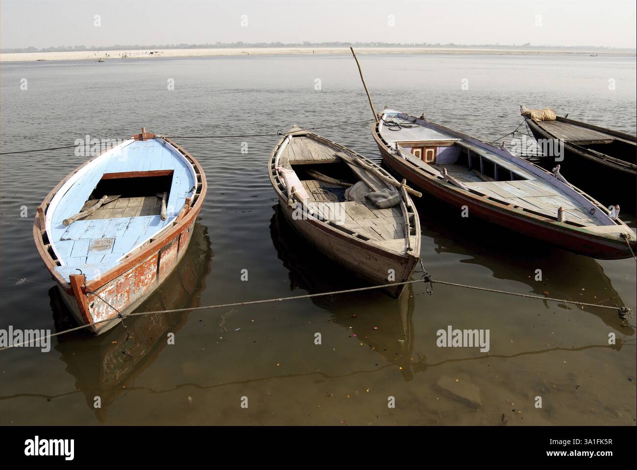 Boats berth at the Ghats of Varanasi, or banaras, (also known as Kashi ...