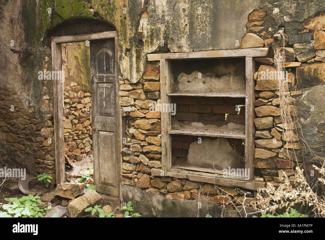 Door and rack of abandoned house, Kalamb, Taluka Vasai, District Thane ...