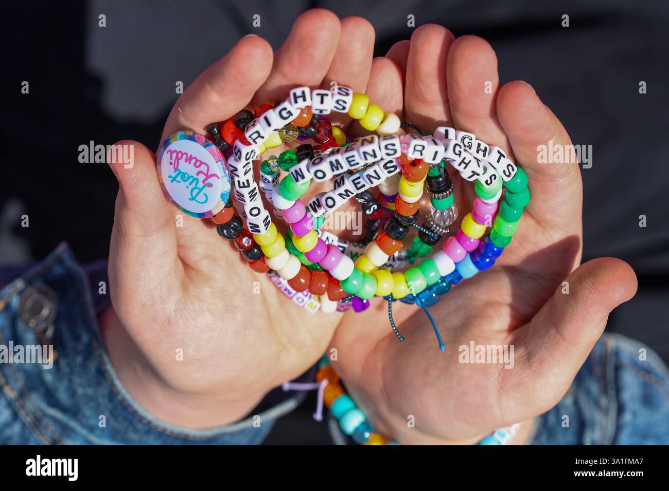 Baltimore, USA. 08th Mar, 2025. Women and allies gather to stand up for ...