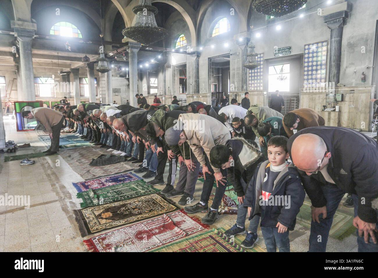 Nablus, West Bank, Palestine. 8th Mar, 2025. Palestinians pray during ...