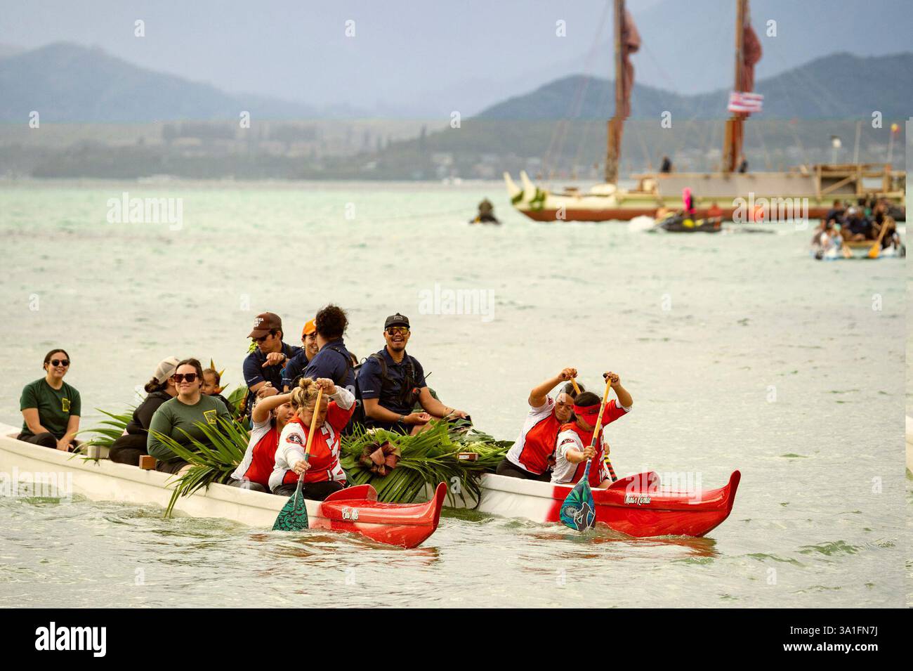 Kaneohe Canoe Club paddles the crew members of Hokulea before Hokulea's ...