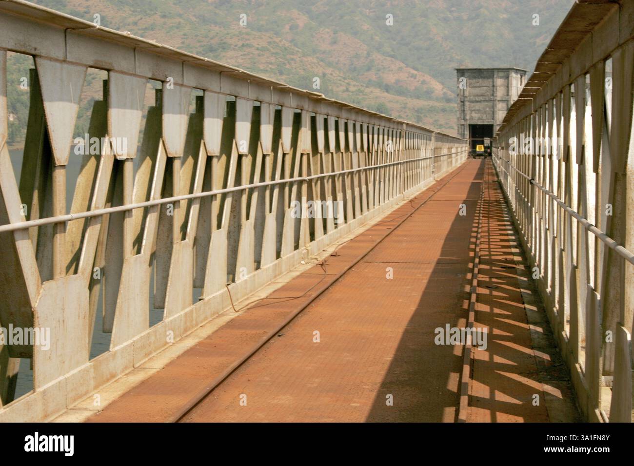 Abstract of bridge made on Dhom Dam with rail tracks Wai, Maharashtra ...