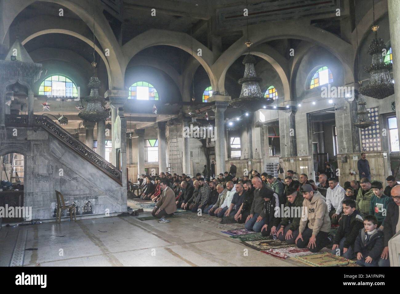 March 8, 2025, Nablus, West Bank, Palestine: Palestinians pray during ...