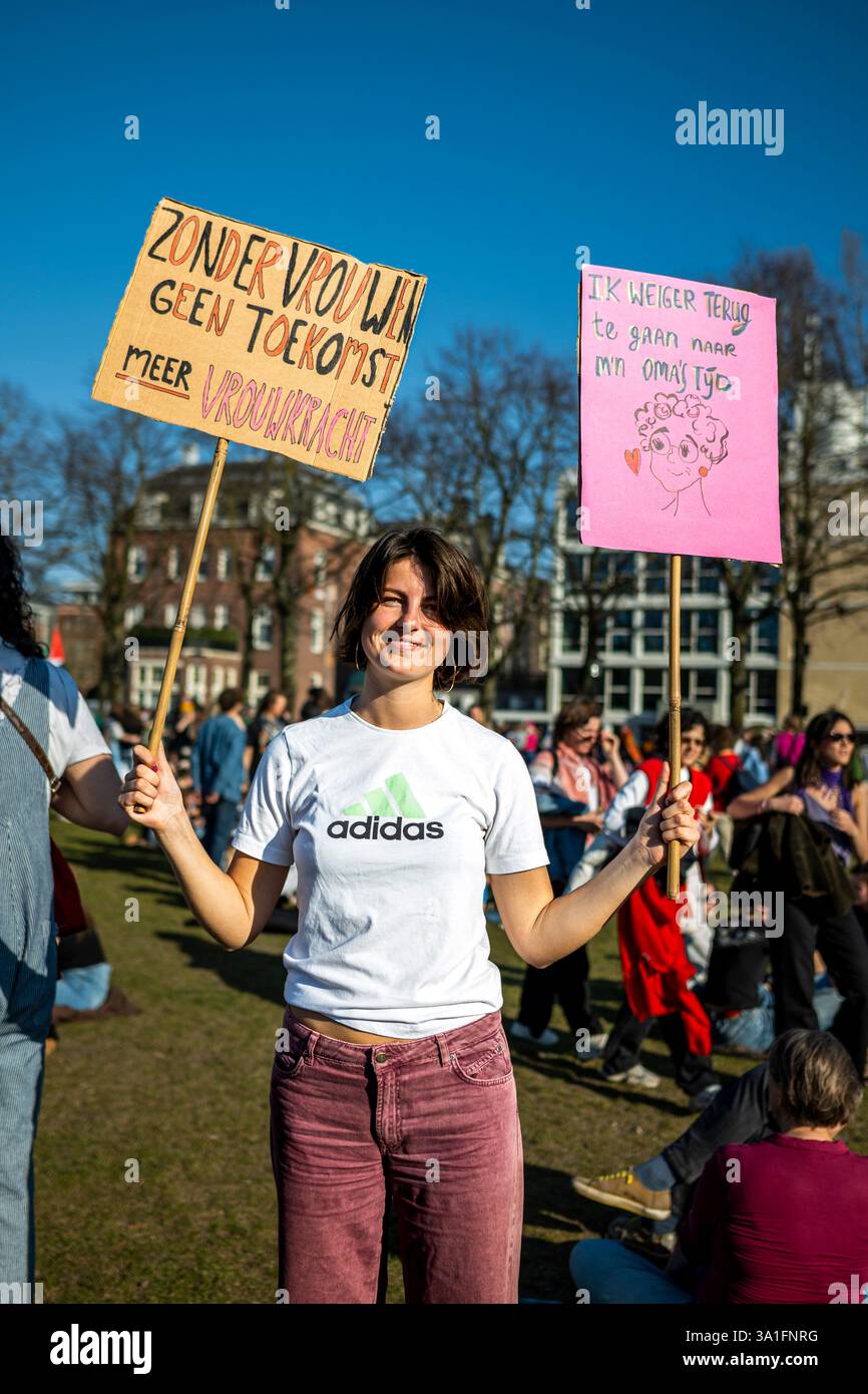 Amsterdam, North Holland, Netherlands. 8th Mar, 2025. A demonstrator ...