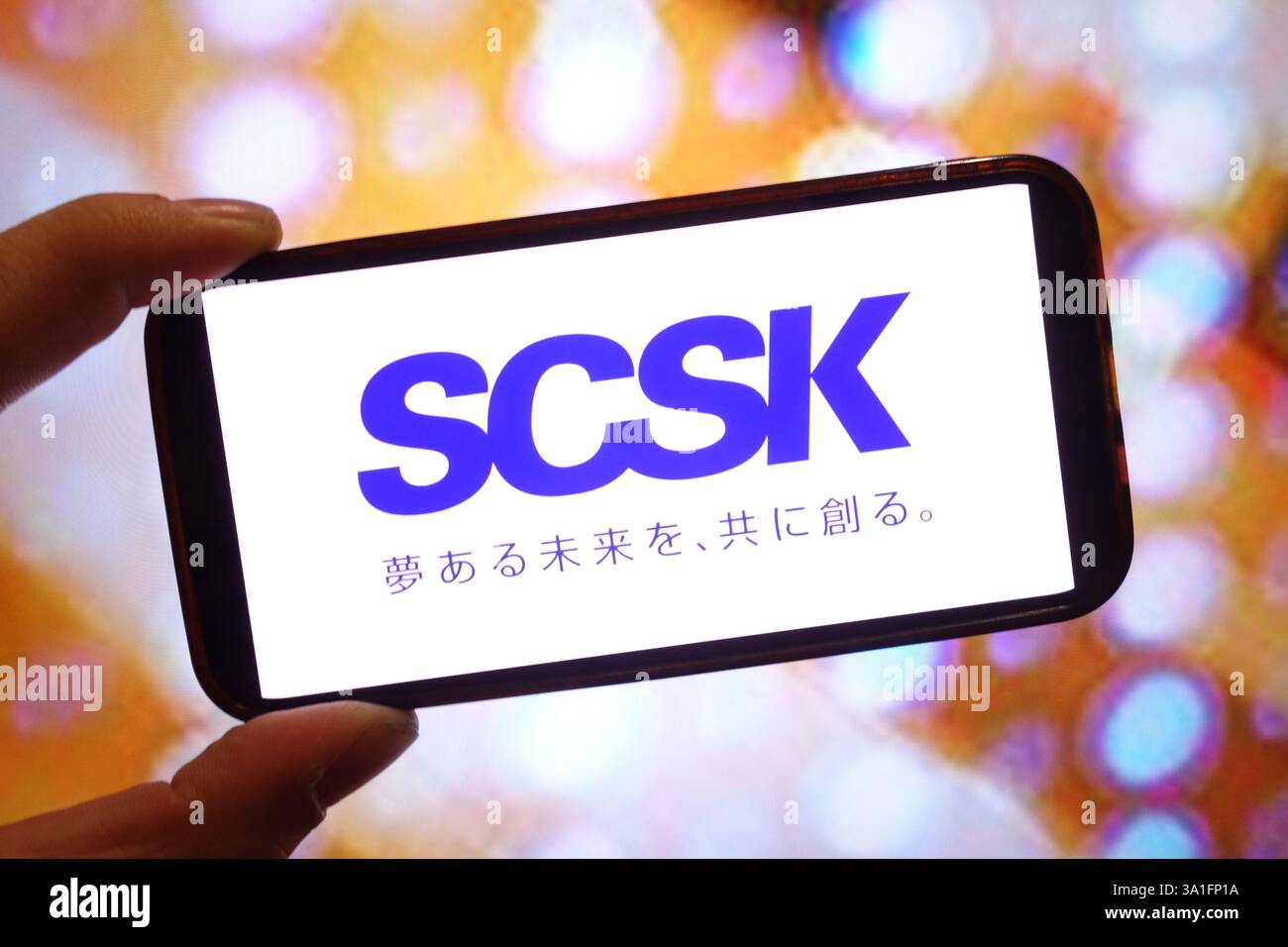 In this photo illustration, the SCSK Corporation company logo is seen ...