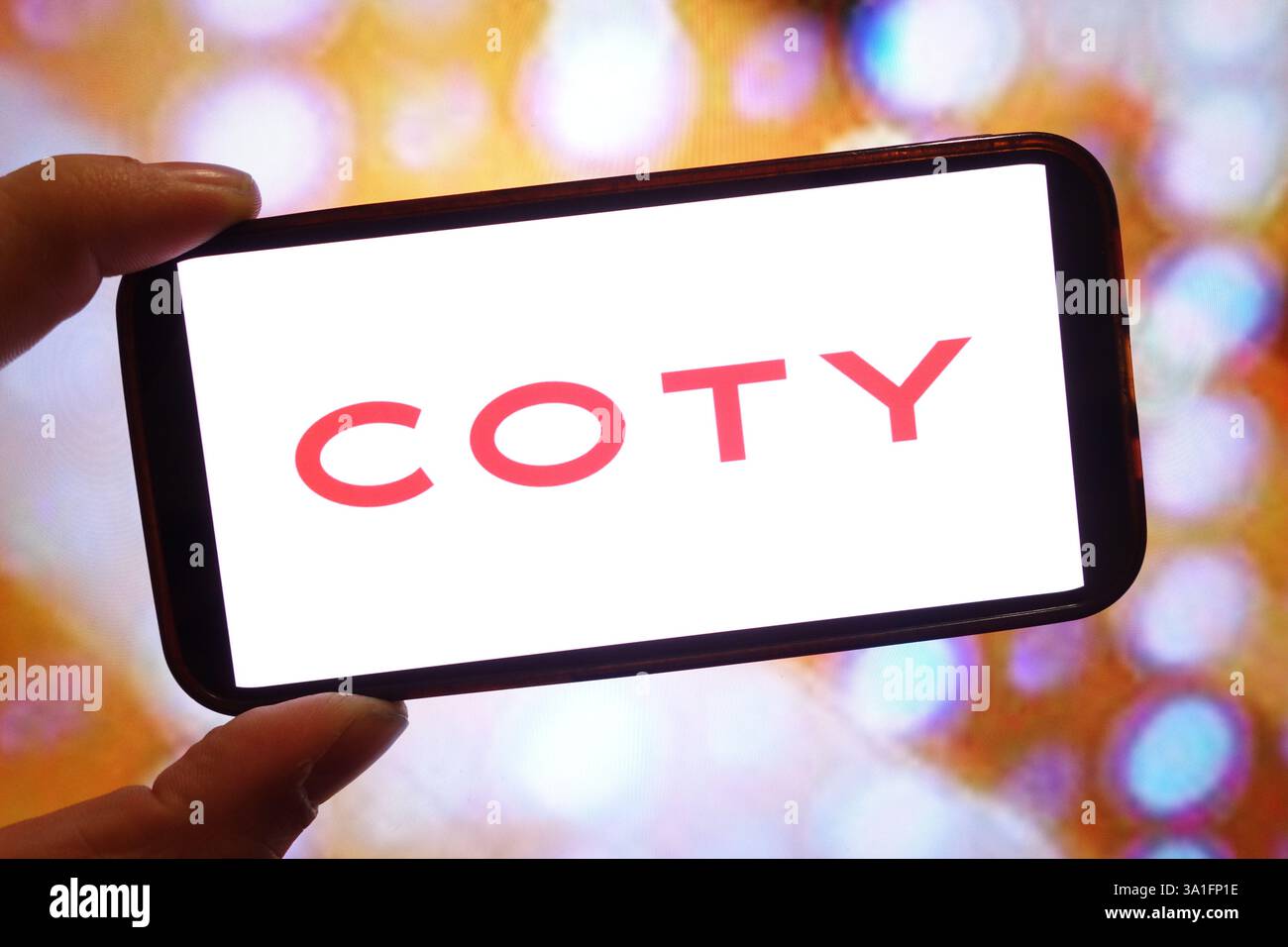 In this photo illustration, the Coty Inc company logo is seen displayed ...