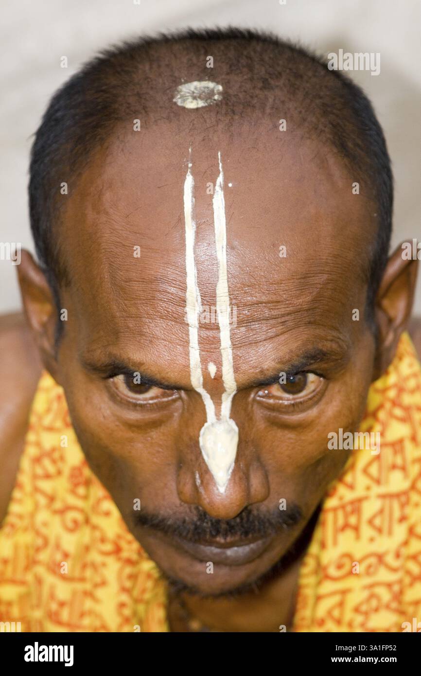 White tilak on forehead of Hindu saint in Varanasi on Ganga river ...