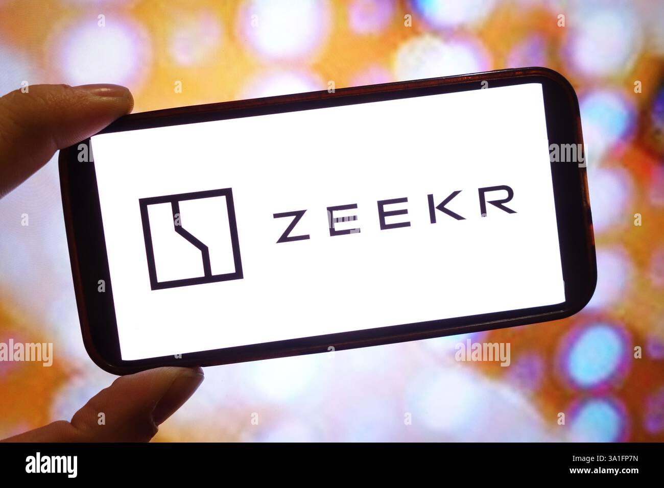 In this photo illustration, the Zeekr company logo is seen displayed on ...