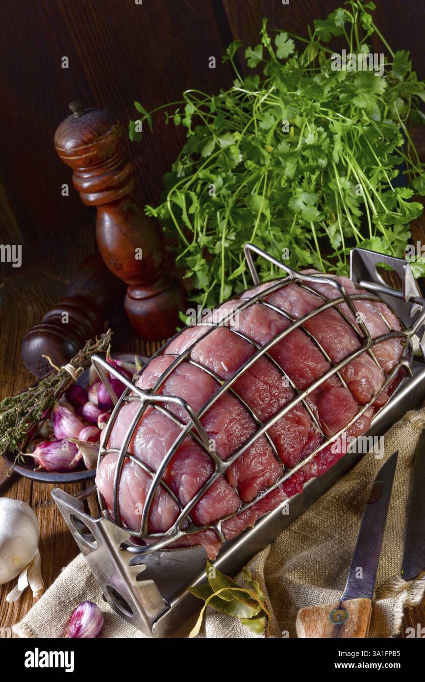 Pressure ham cooker with raw ham Stock Photo - Alamy
