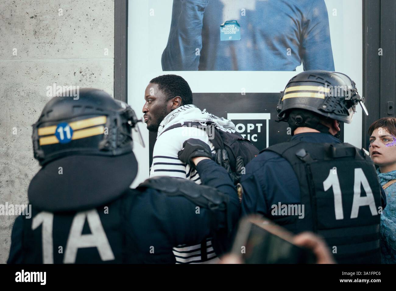 Paris, France. 08th Mar, 2025. A protester is arrested by CRS police ...