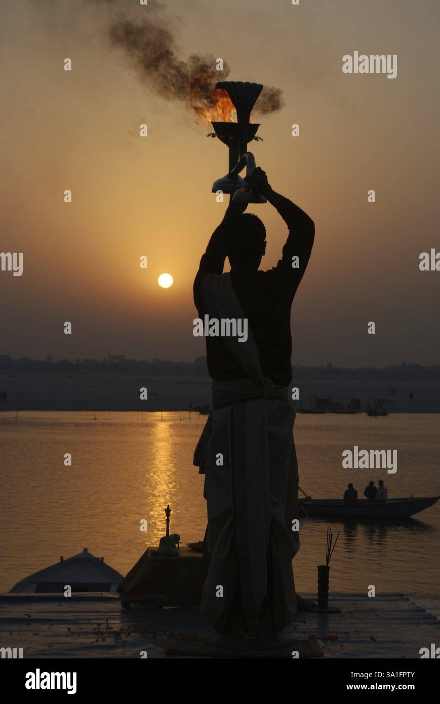 Aarti of Ganga and rising sun at Ghats, Varanasi, Uttar Pradesh, India ...