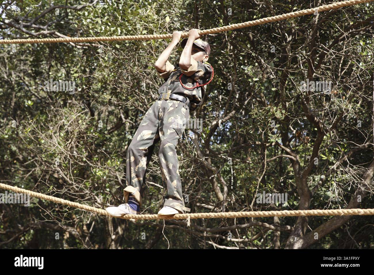 Commando Obstacles training, cadet crossing the distance with Hand and ...