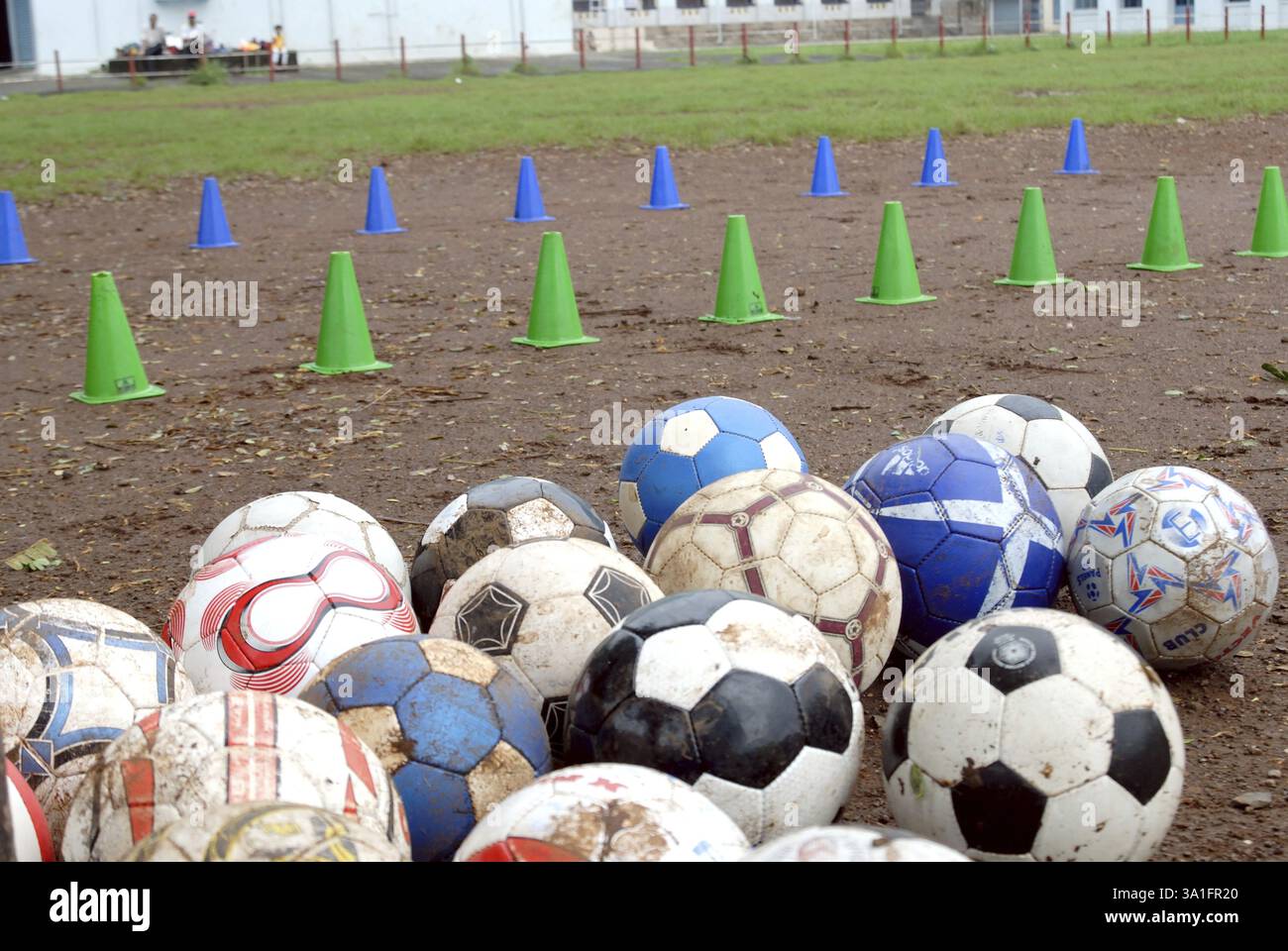 Foot balls & cones are kept for practice in ground during monsoon ...