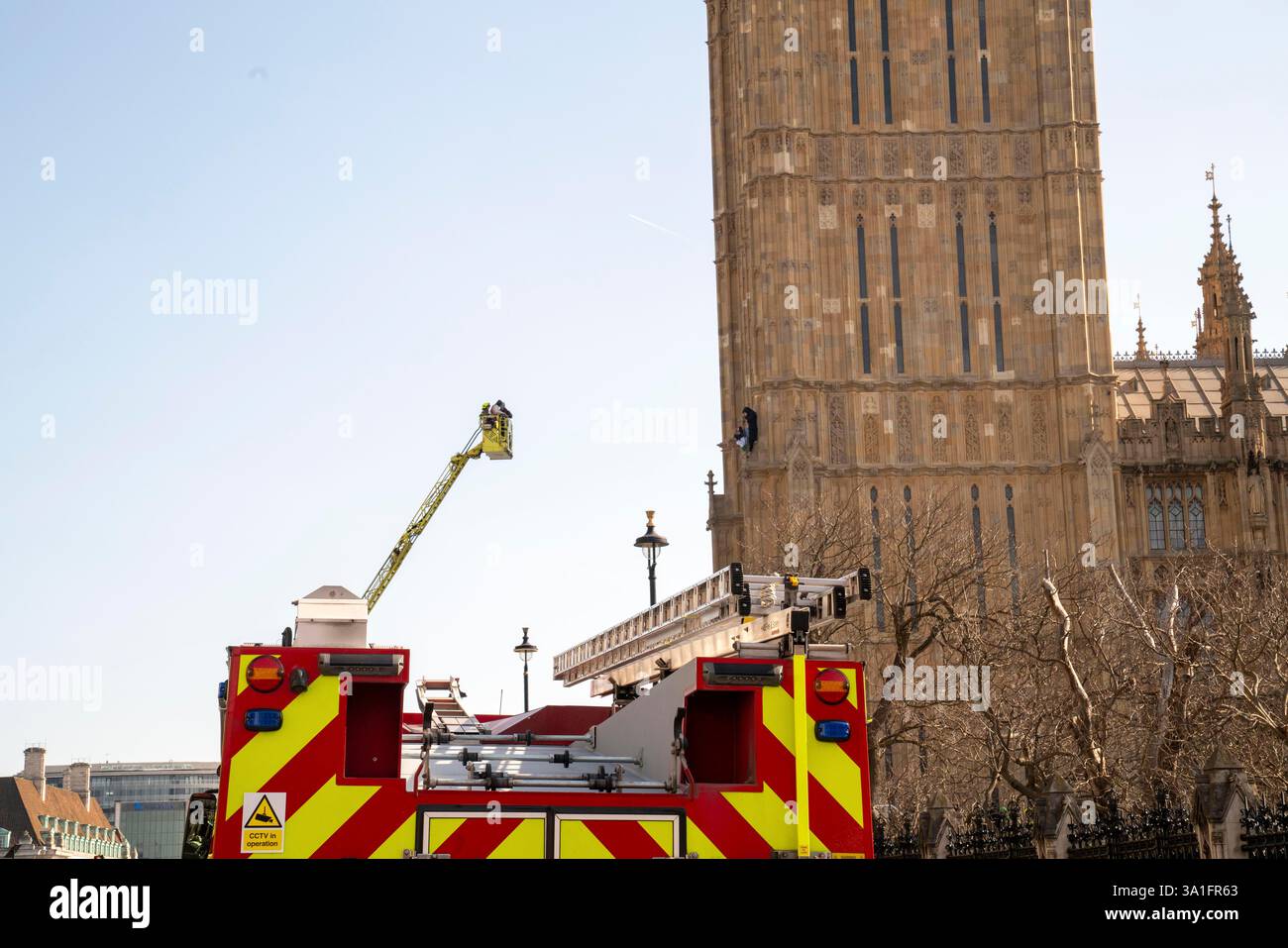 Westminster, London, UK, 8TH March, UK, - Protestor climbes the ...