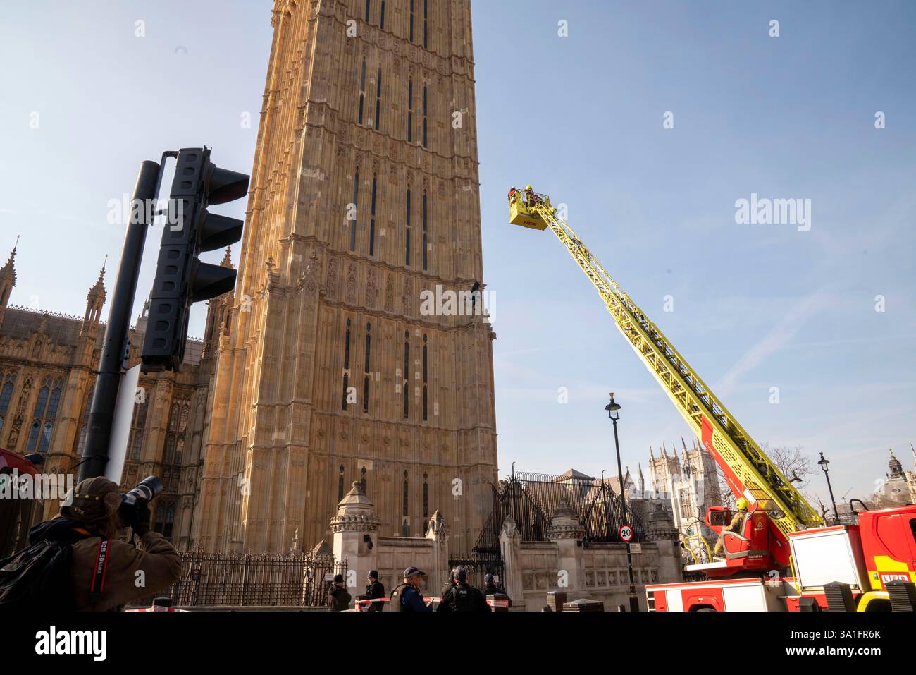 Protestor climbes the Elizabeth Tower to protest for the Filton 18 and ...