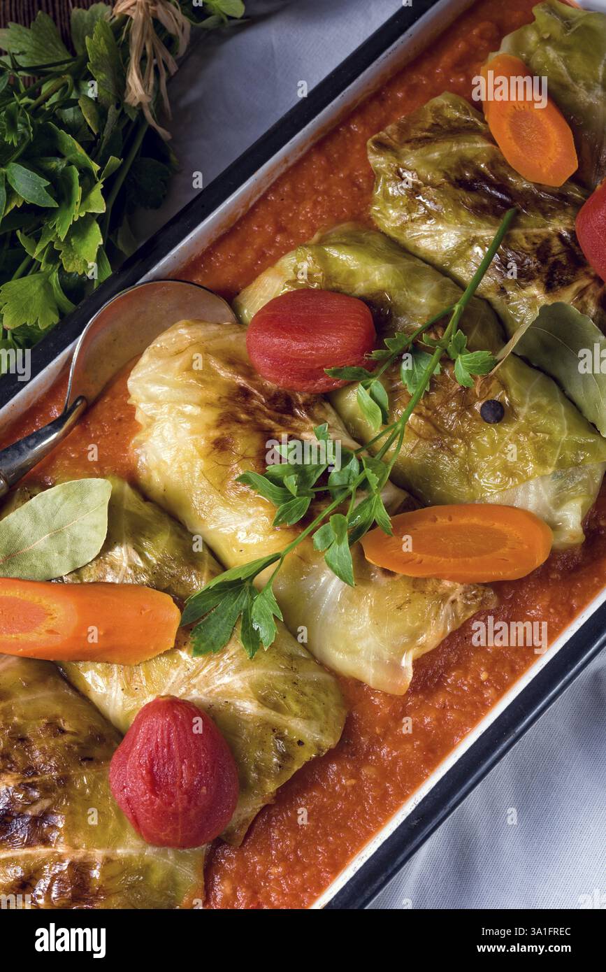 Golabki - polish cabbage rolls in tomato sauce Stock Photo - Alamy