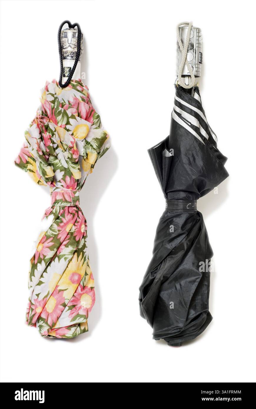 One ladies umbrella with a floral pattern and a black umbrella for men ...