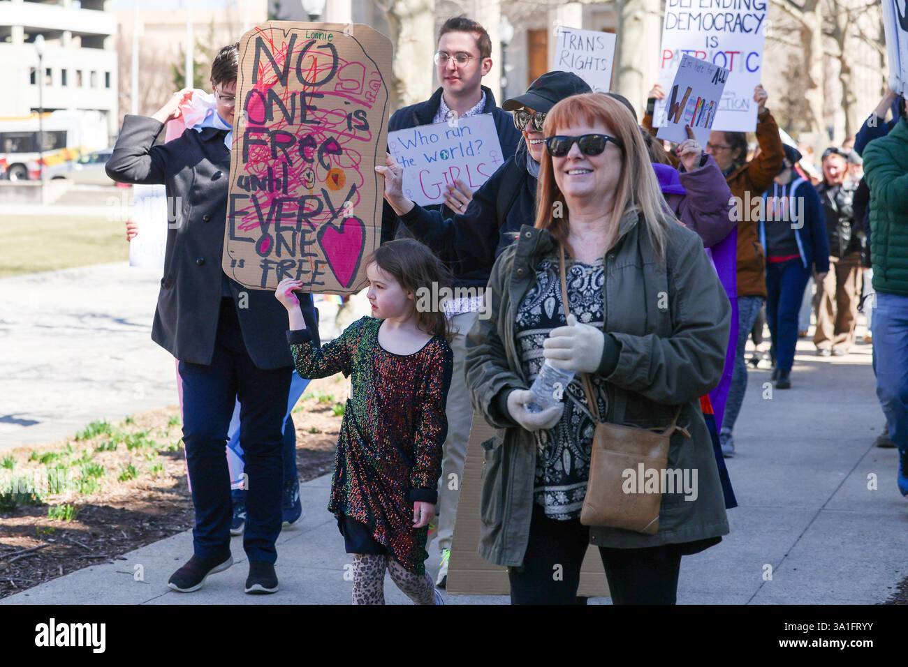 Baltimore, USA. 08th Mar, 2025. Women and allies gather to stand up for ...