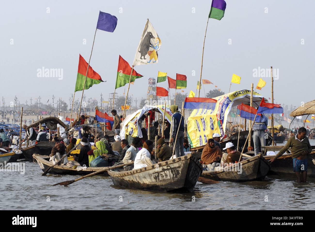 Boats ferry devotees at the confluence of the Ganges, Yamuna the ...