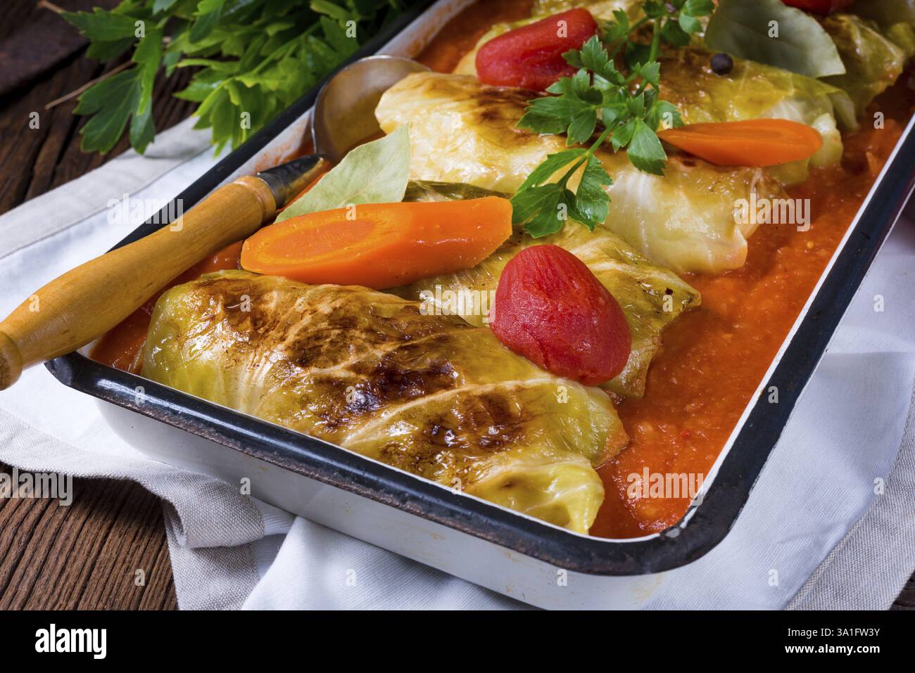 Golabki - polish cabbage rolls in tomato sauce Stock Photo - Alamy