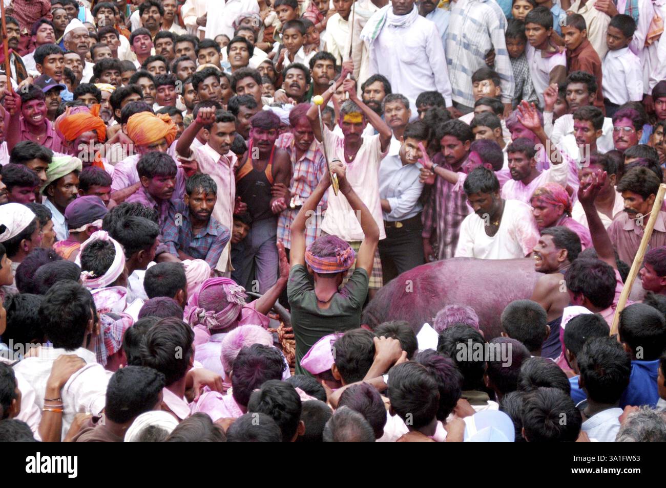 People watching the traditional sacrifice of buffalo at the traditional ...