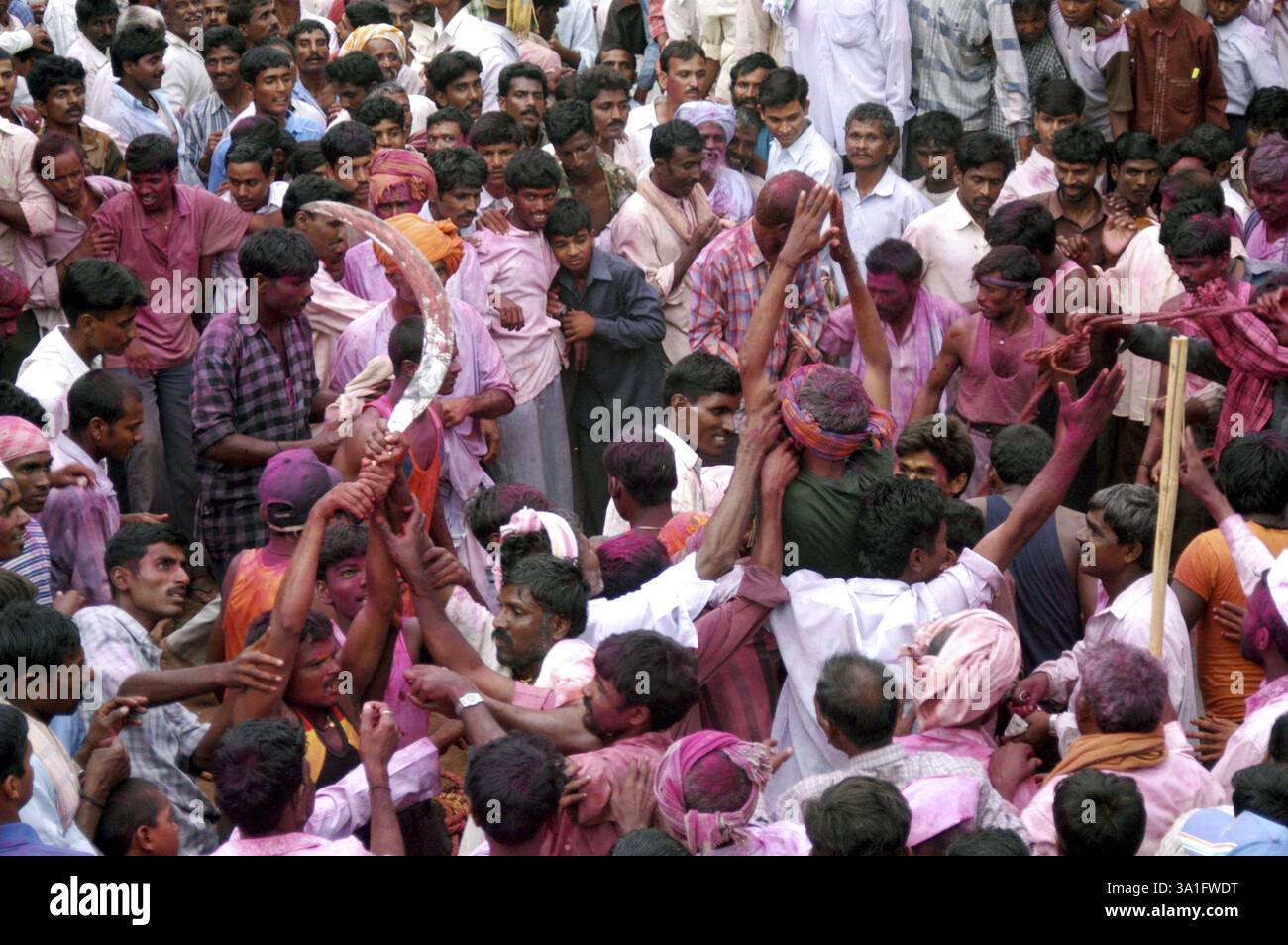 People watching the traditional sacrifice of buffalo at the traditional ...