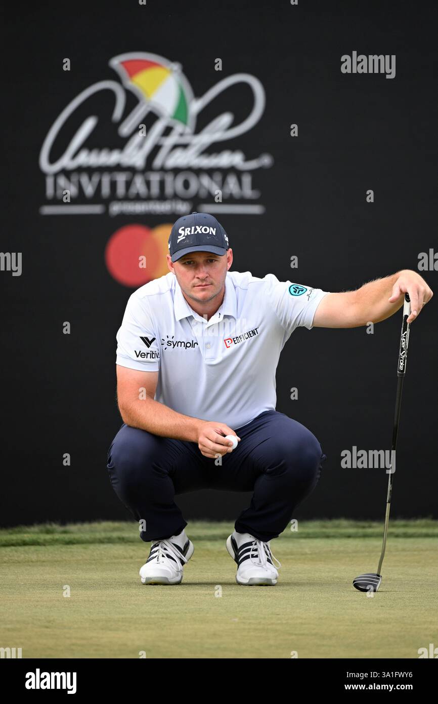 Sepp Straka, of Austria, lines up a putt on the 14th green during the ...