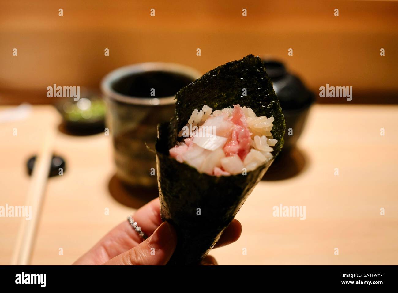 Negitoromaki: maki sushi roll with onion and negitoro (minced raw tuna ...