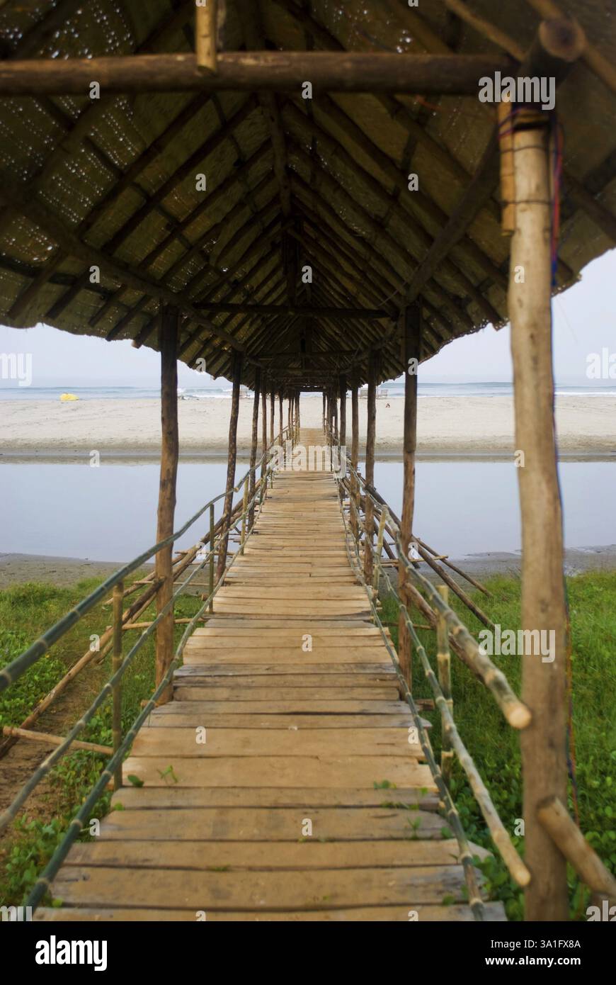 Foot over bridge across mass water just before Mandarin beach, Goa ...