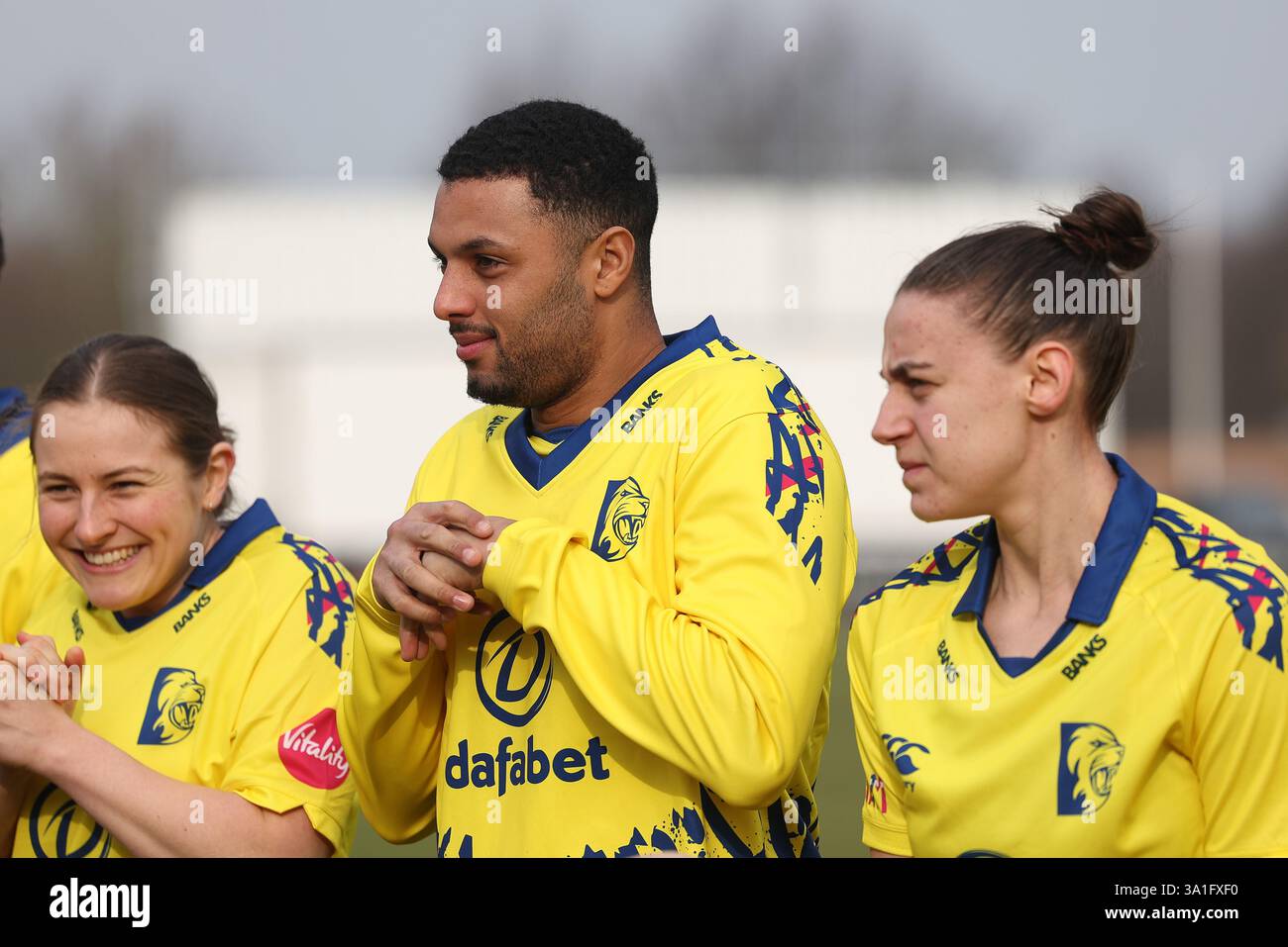 Durham Cricket's Emilio Gay (c) flanked by Mia Rogers (l) and Leah ...