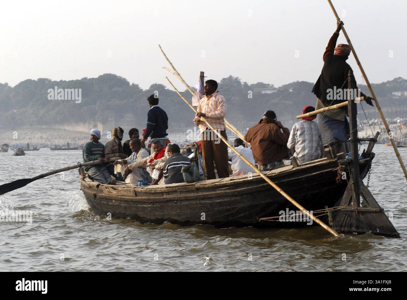 Boats ferry devotees at the confluence of the Ganges, Yamuna the ...