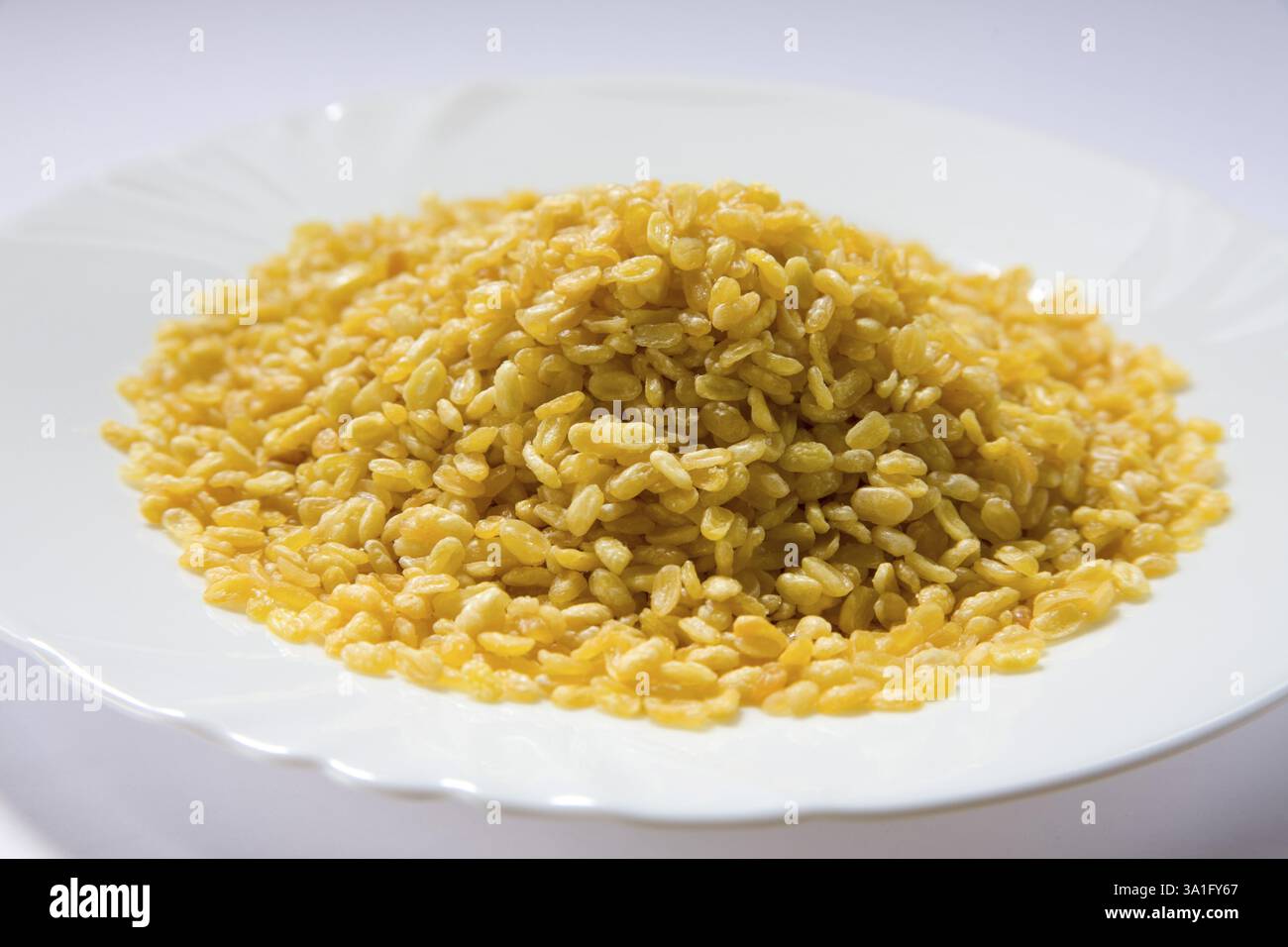 Junk food snacks salty deep fry Moong dal lentil beans served in plate ...