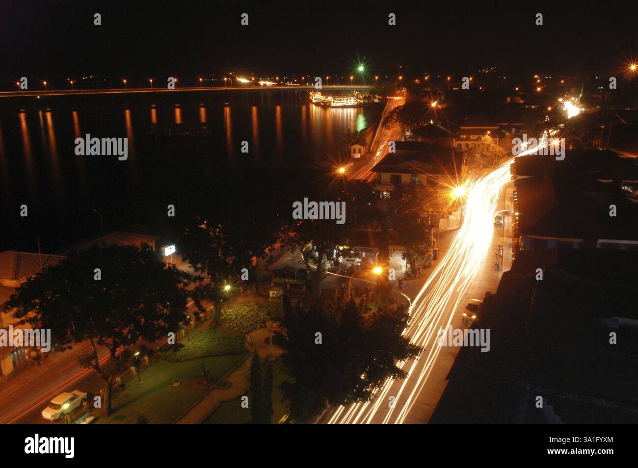 An aerial view of Panjim city at night on the banks of Mandovi River in ...