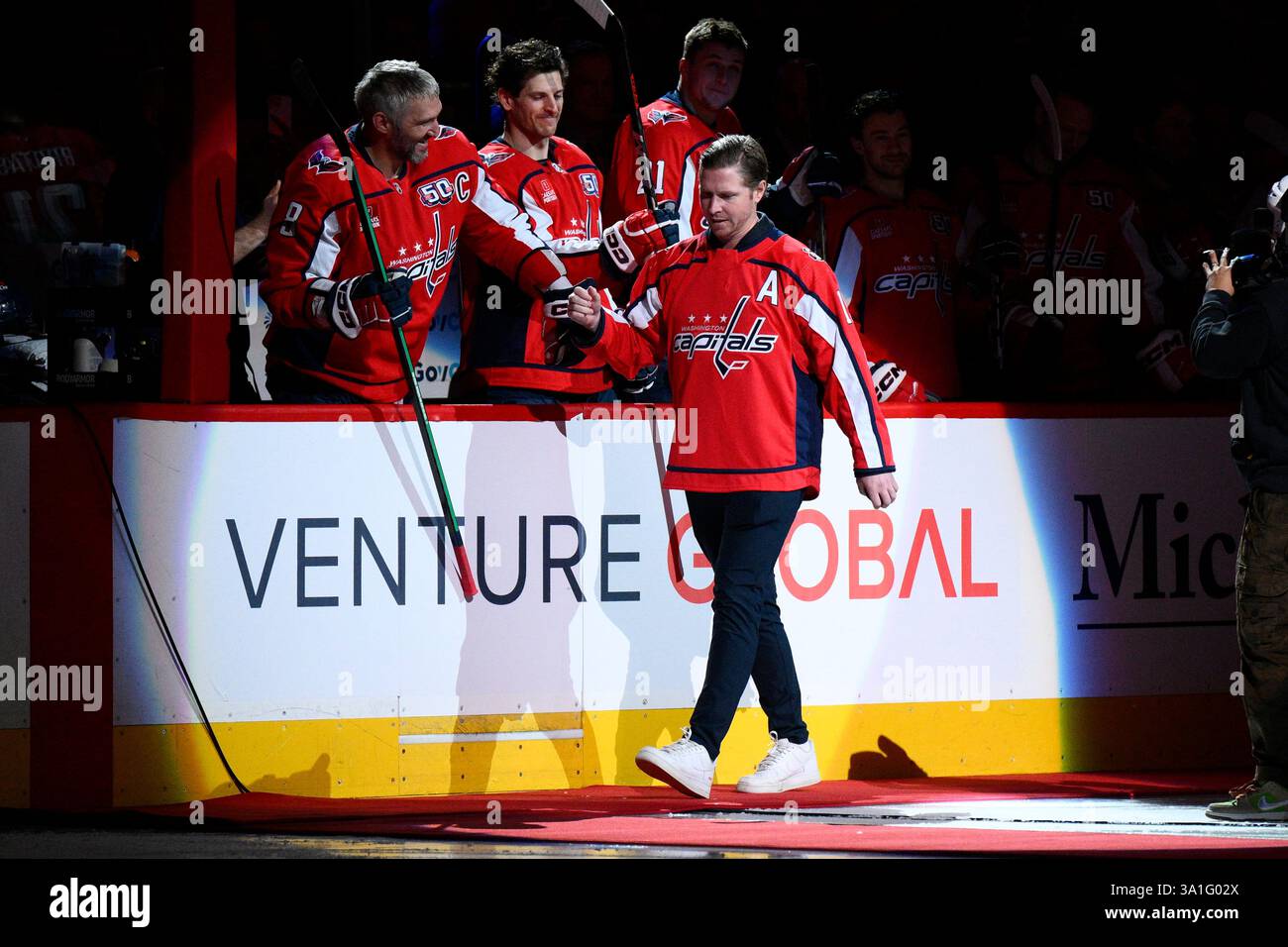 Washington Capitals player Nicklas Backstrom, front, takes part in a ...
