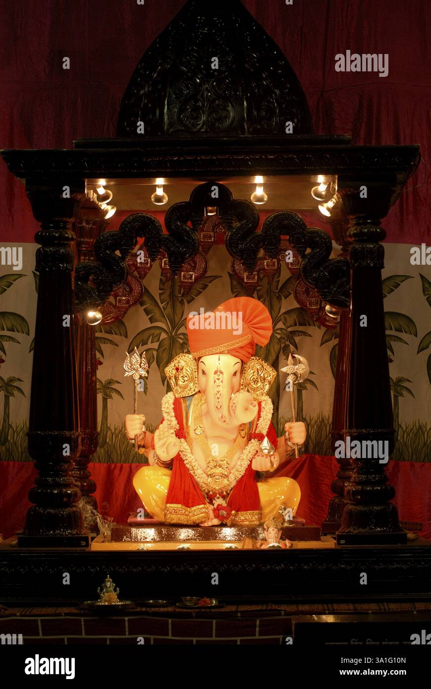 Idol of Lord Ganesh wearing turban, worshiping for Ganapati festival ...