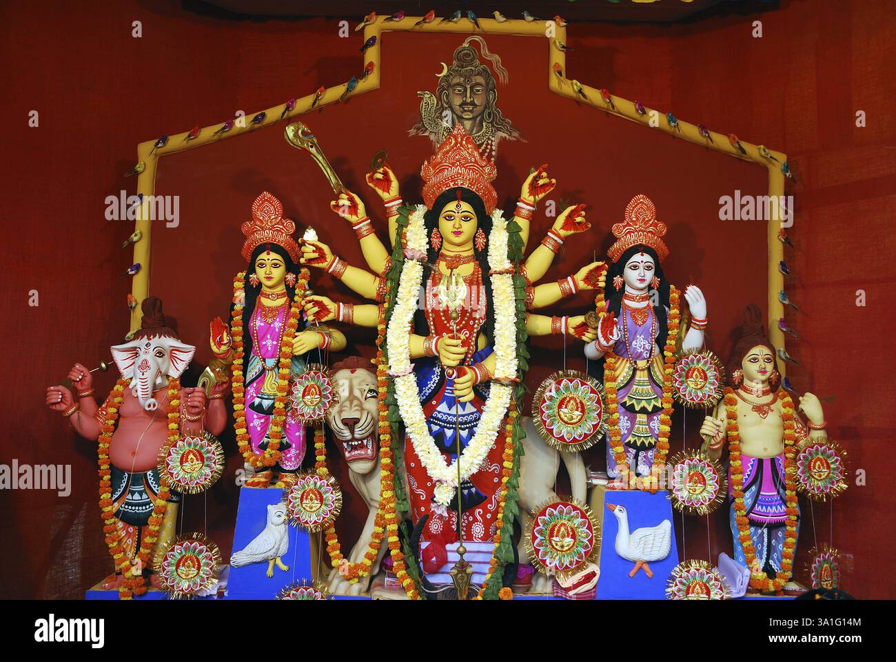 Durga clay model with statues of kartikeya ganesha and lakshmi ...