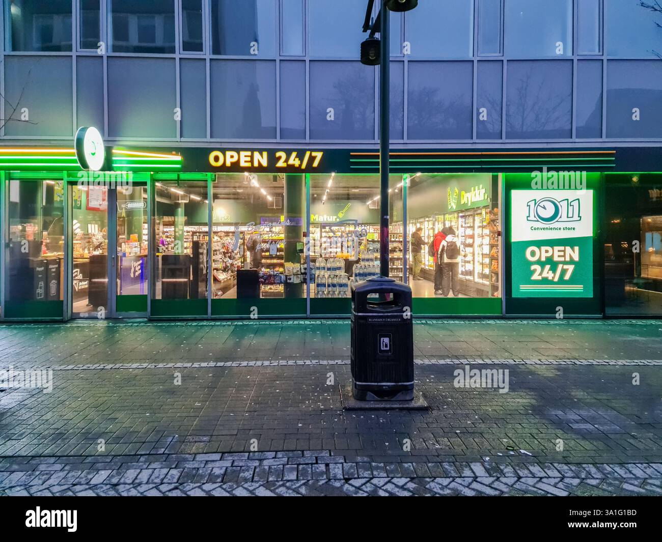 Reykjavik, Iceland - 05. March 2025: Customers shopping inside a ...