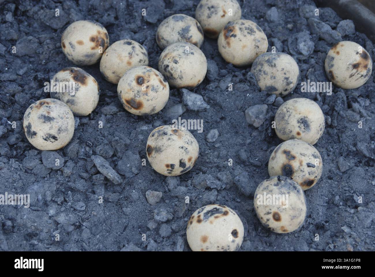Baati baked on hot ash, Pushkar, Rajasthan, India, Asia Stock Photo - Alamy