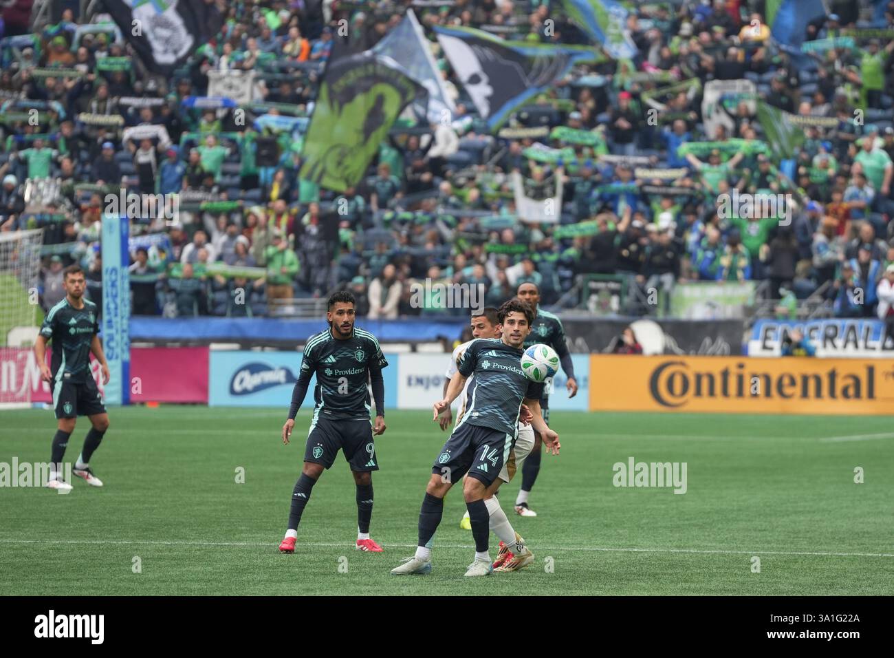 Seattle Sounders FC Forward Paul Rothrock (14) shields the ball from ...