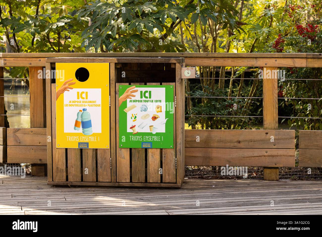 A set of recycling bins positioned in a public outdoor space Stock ...
