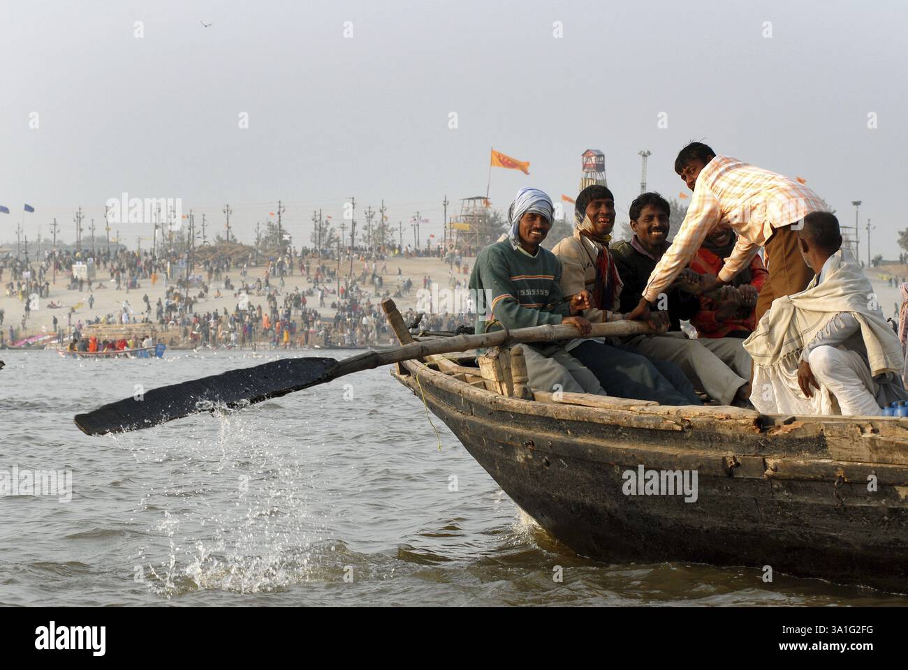 Boats ferry devotees at the confluence of the Ganges, Yamuna the ...
