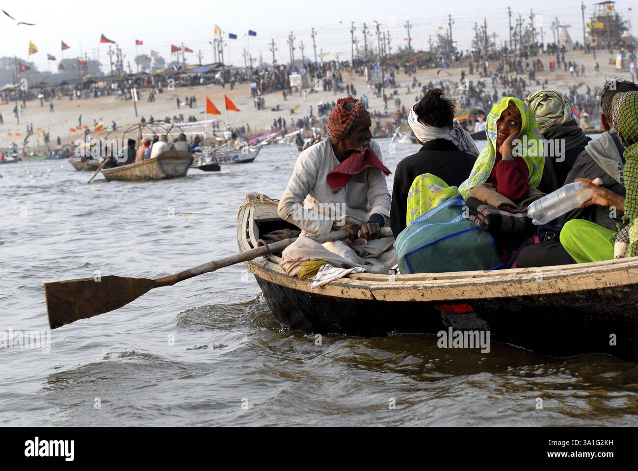 Boats ferry devotees at the confluence of the Ganges, Yamuna the ...