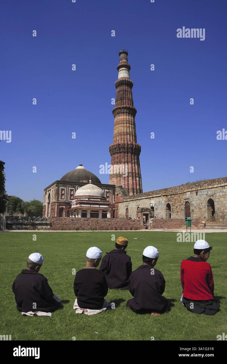 Children doing Namaz in front of Alai Darwaza, Imam Zamin's tomb and ...