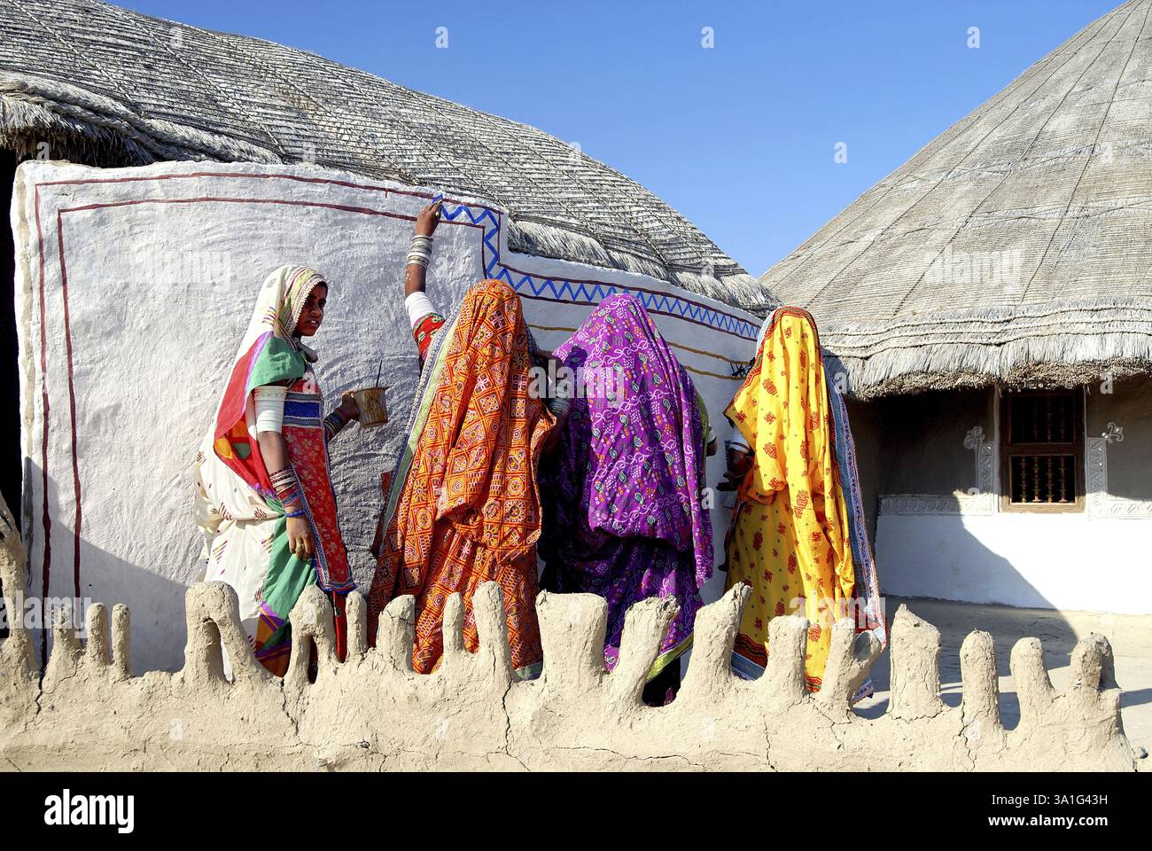 The local rabaris painting at the Shaam-E-Sarahad, Banni, Kutch ...