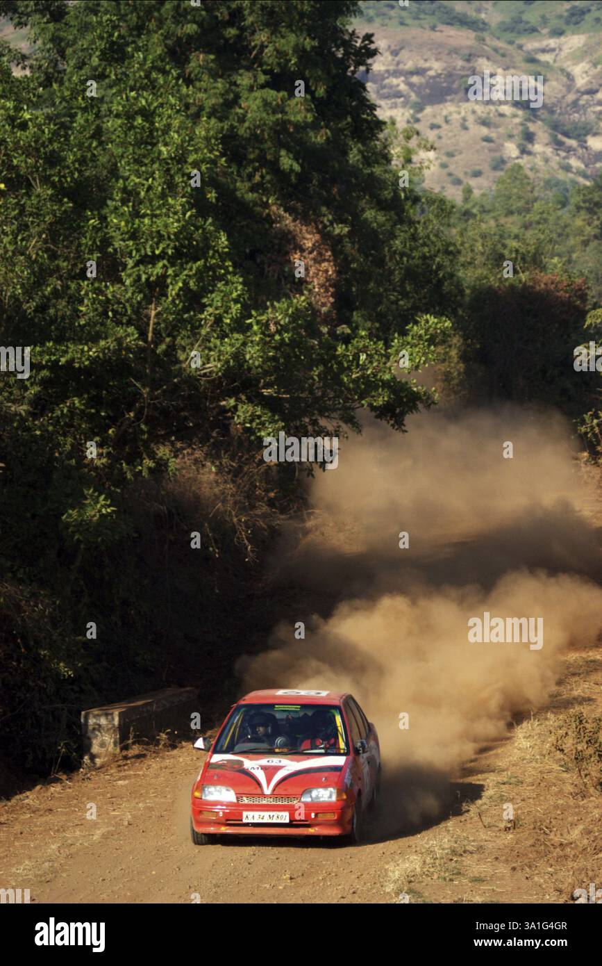 Fast car power on way through in second special stage, MRF Rally at ...