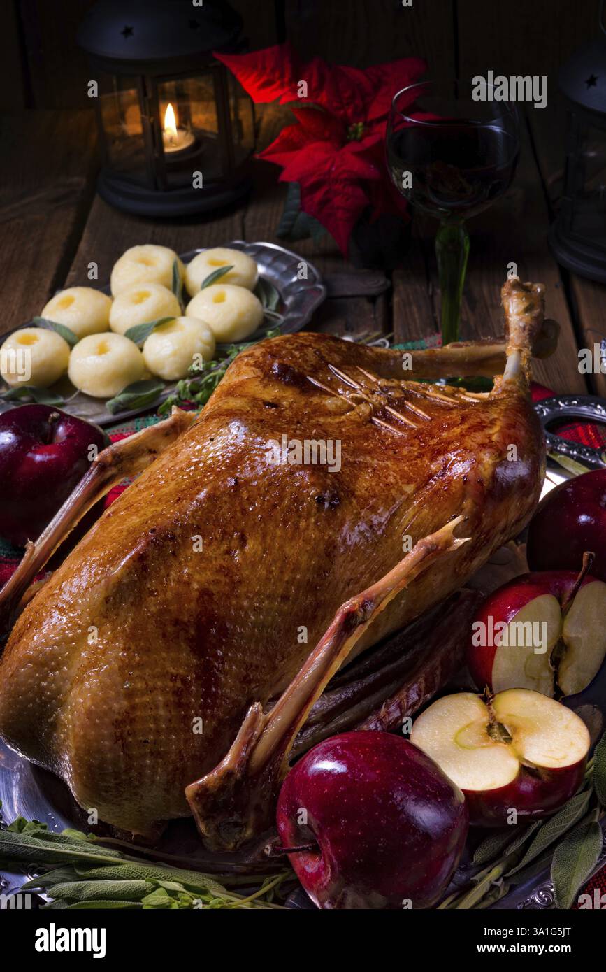 Roast Christmas duck with apples Stock Photo - Alamy