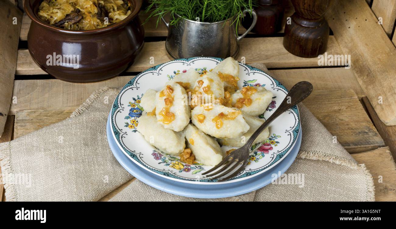 Silesian grey potato dumplings Stock Photo - Alamy