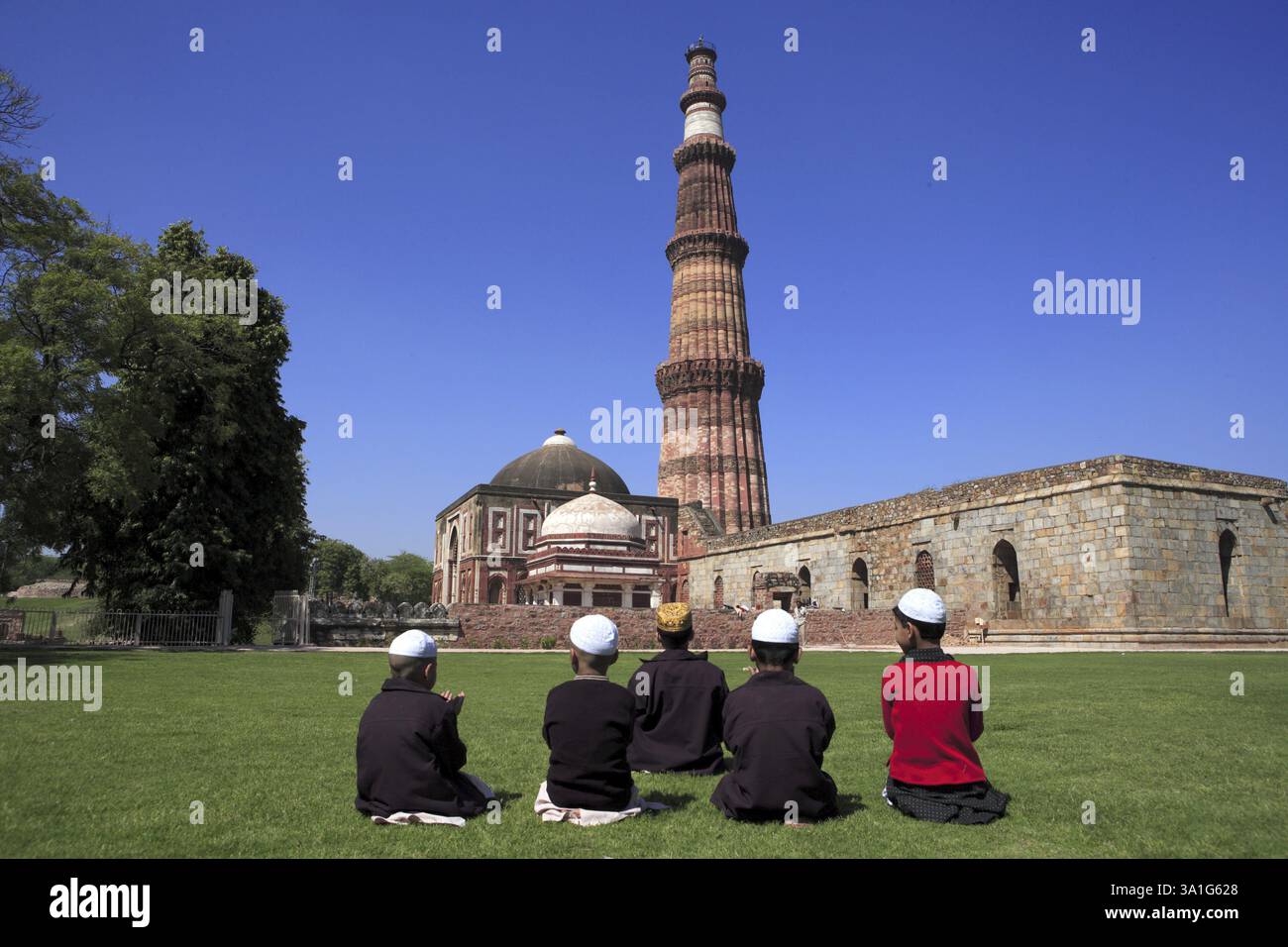 Children doing Namaz in front of Alai Darwaza, Imam Zamin's tomb and ...