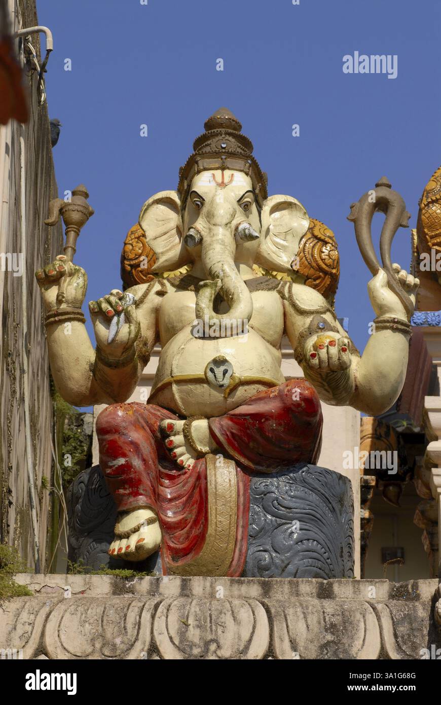 Colourfully painted Lord Ganesh on facade of Shree Durga Parmeshwari ...